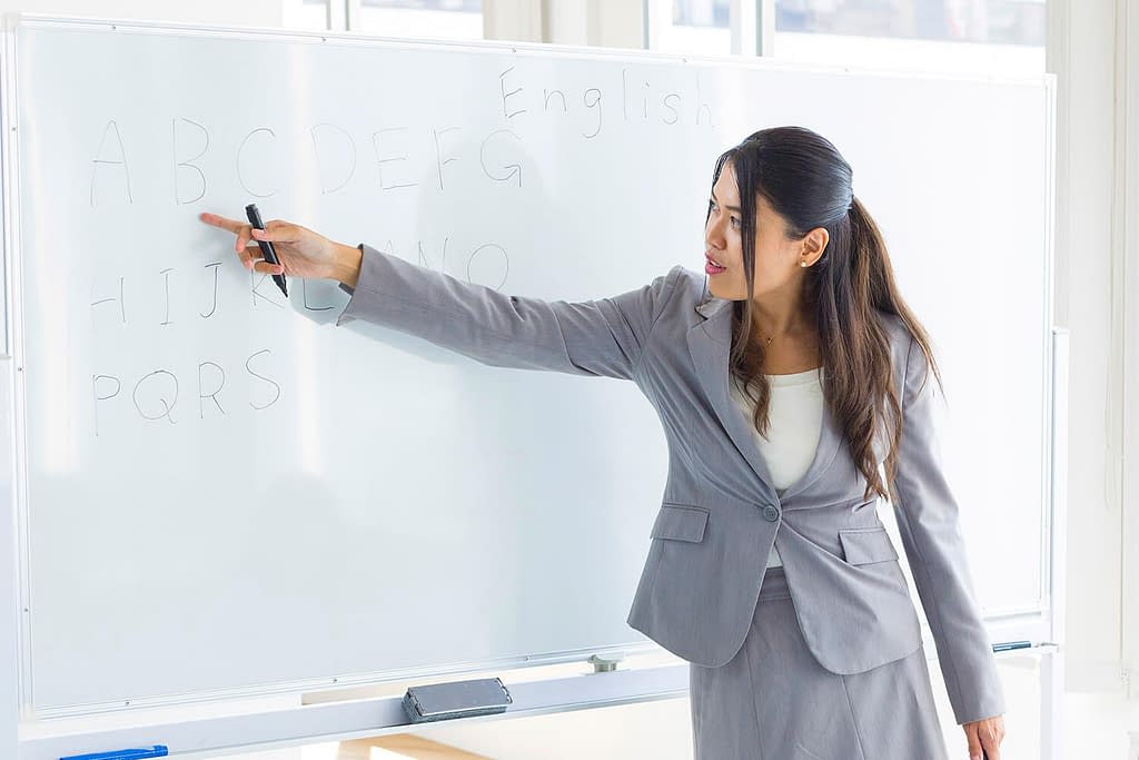 What qualifications are required to teach English in Japan?